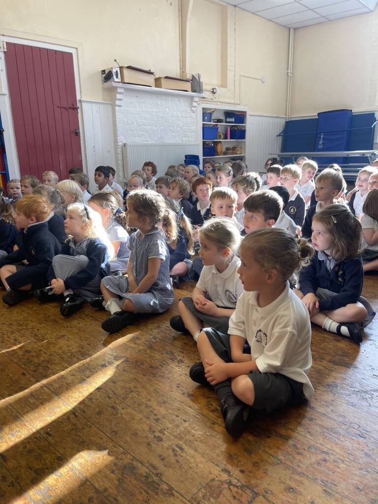 Foundation class enjoy their first Collective Worship - Cuddington and ...